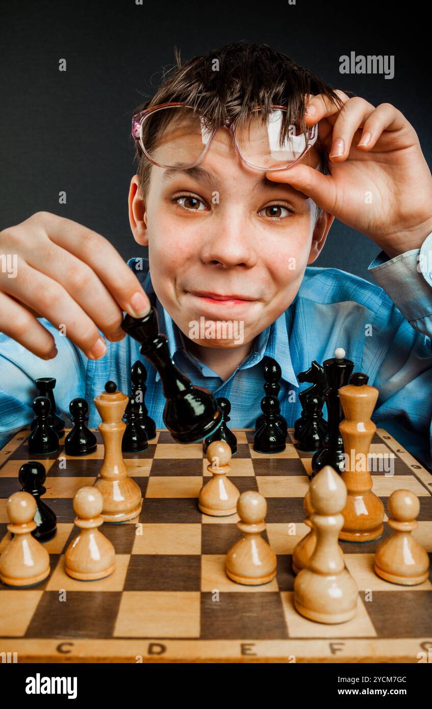 Nerd play chess Stock Photo - Alamy