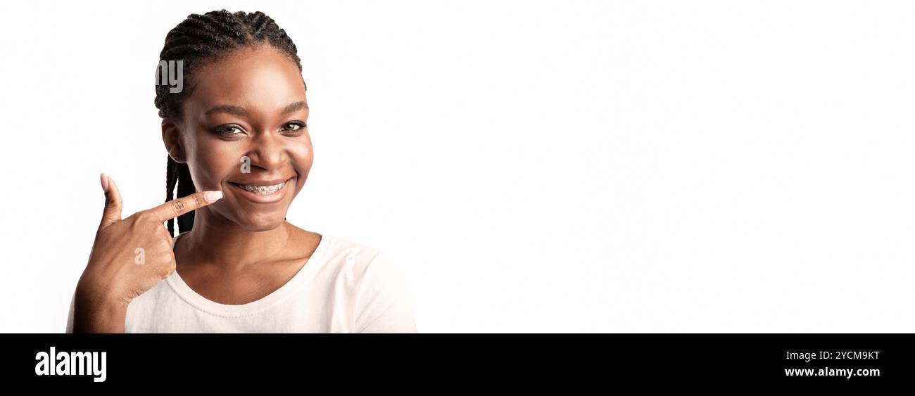 African Lady Pointing Finger At Braces Posing Over White Background ...