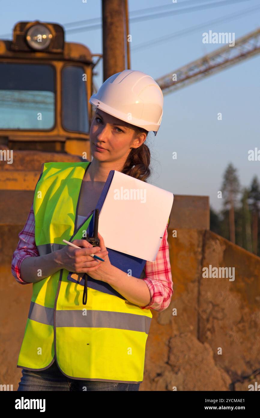 Woman safety helmet construction hi-res stock photography and images ...