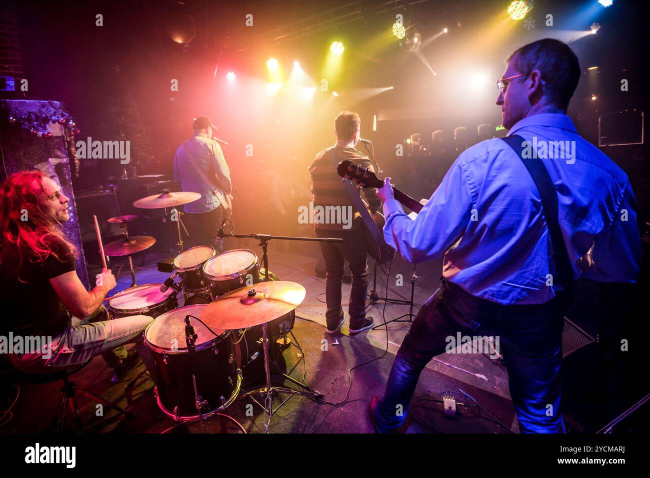 Band performs on stage Stock Photo - Alamy