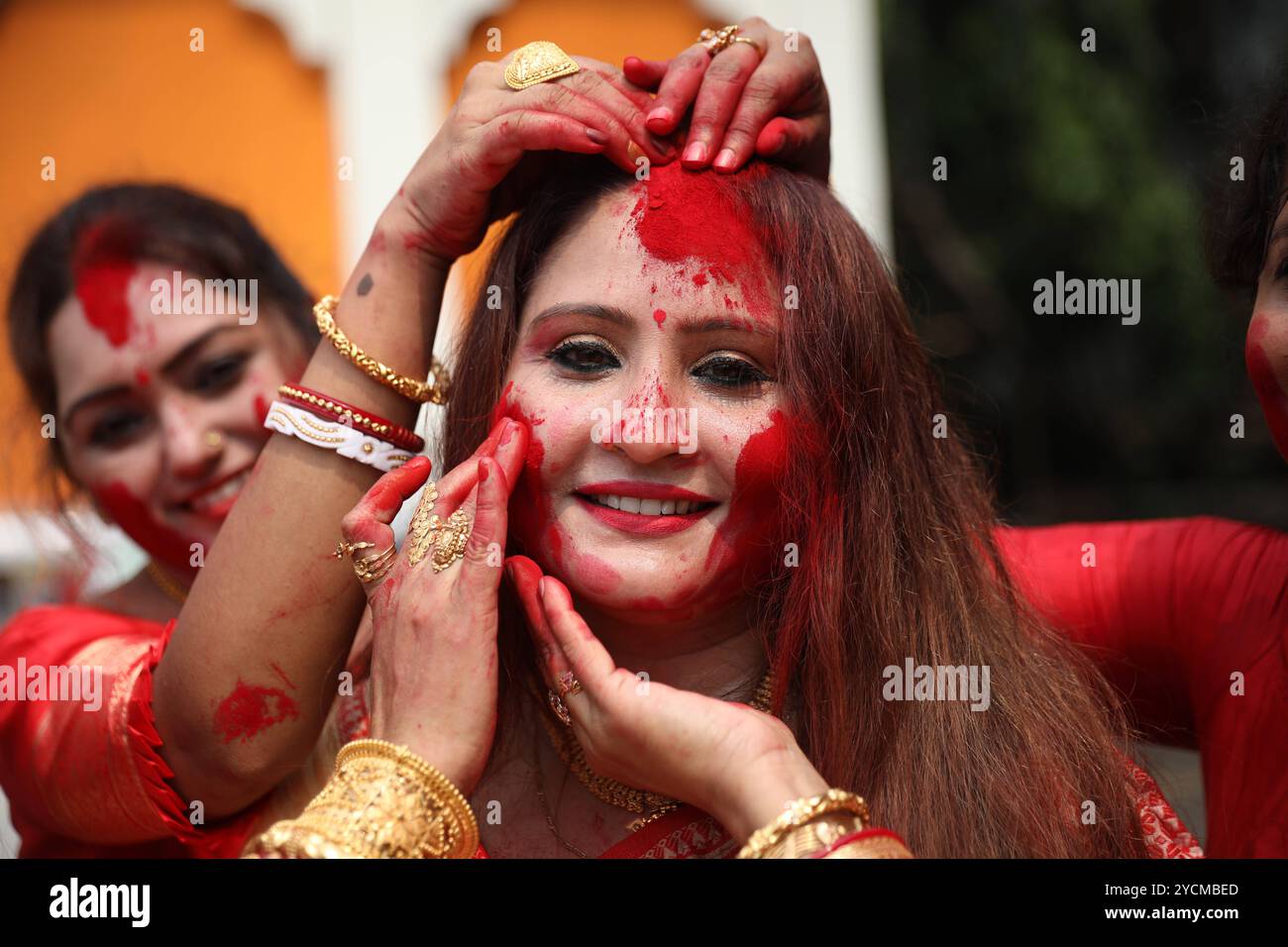 Durga Puja festival in Kolkata, India A Hindu woman s face is smeared ...
