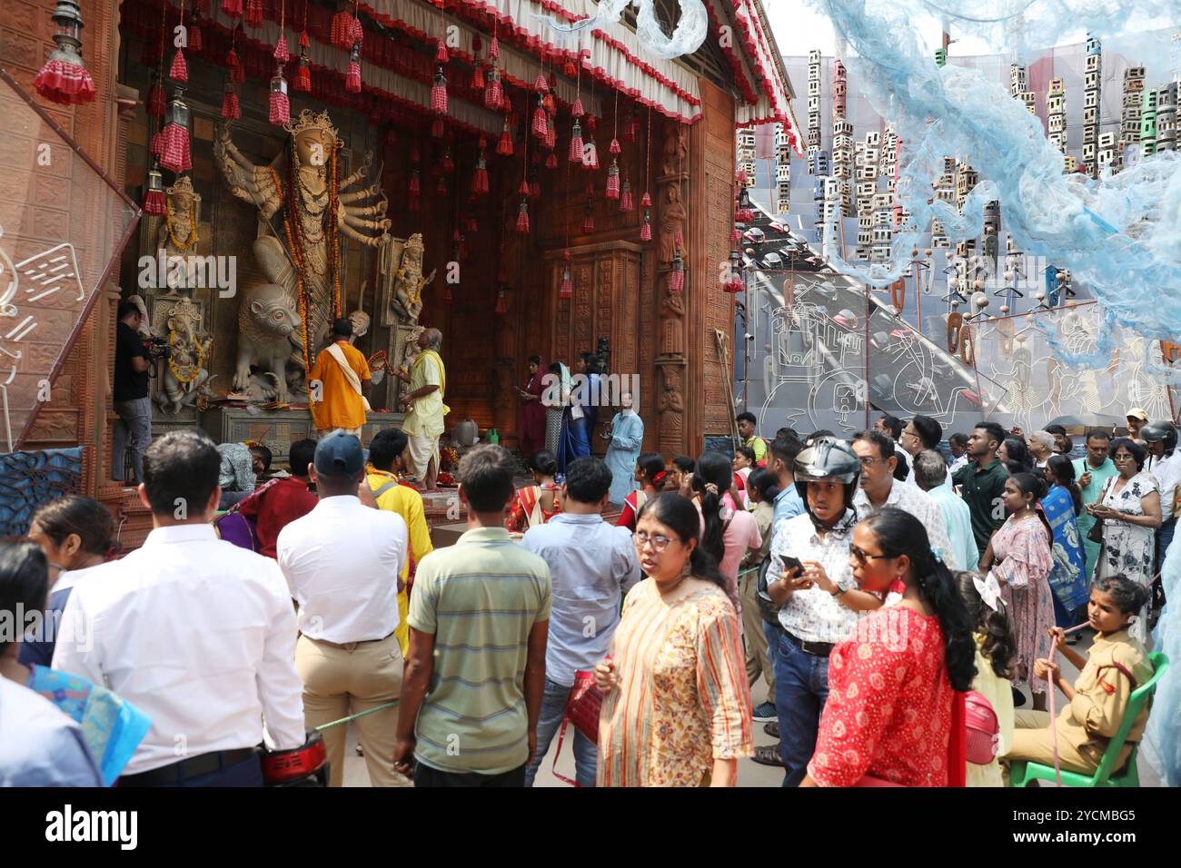 Durga Puja festival in Kolkata, India Indian people visit a pandal ...