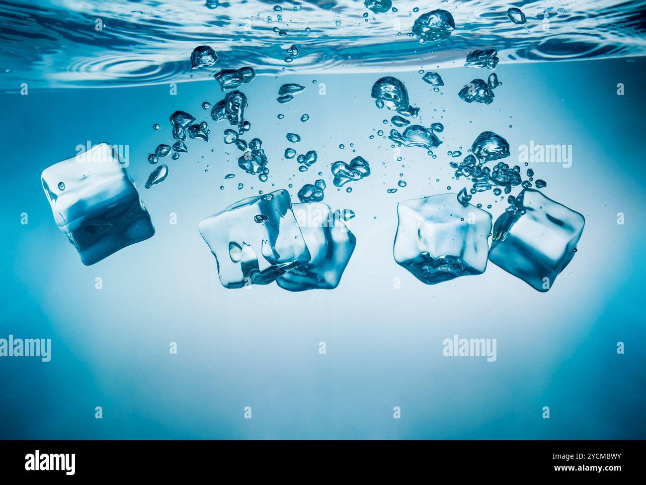 Ice cubes falling blue cocktail hi-res stock photography and images - Alamy