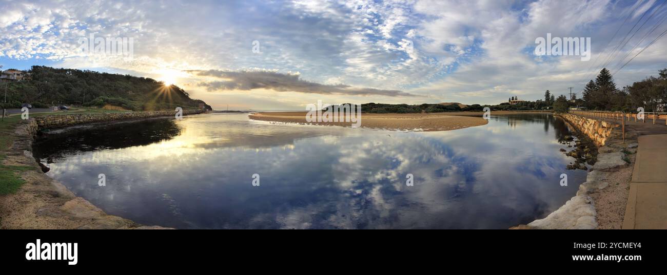 Narrabeen Lakes Entrance panorama early morning with sunburst over the ...