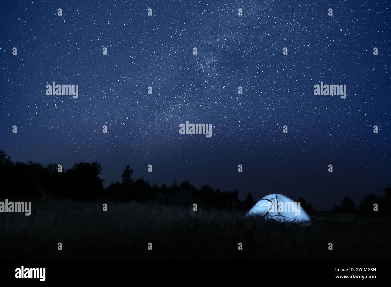Modern camping tent in wilderness at night Stock Photo - Alamy