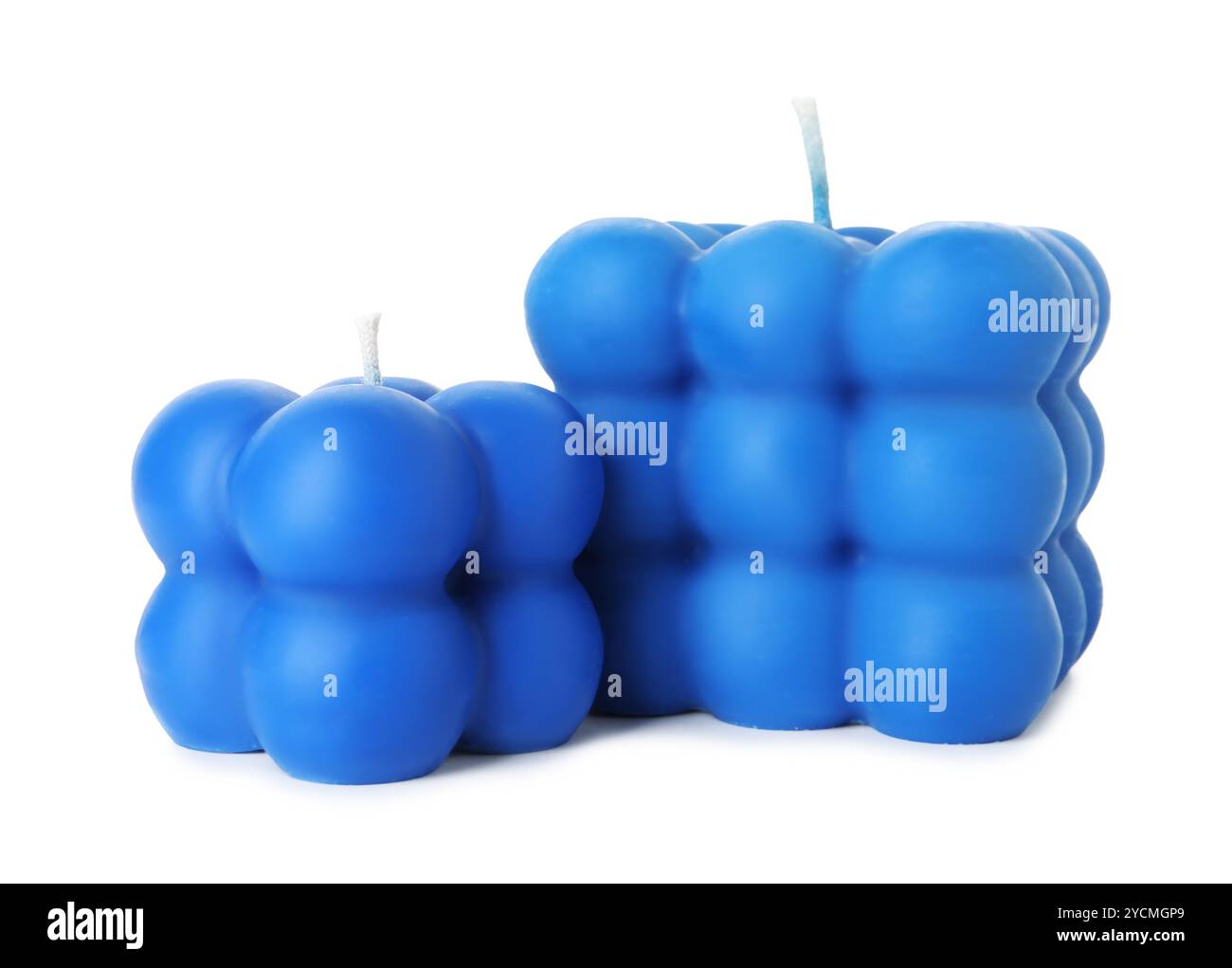 Two candles on white Cut Out Stock Images & Pictures - Alamy
