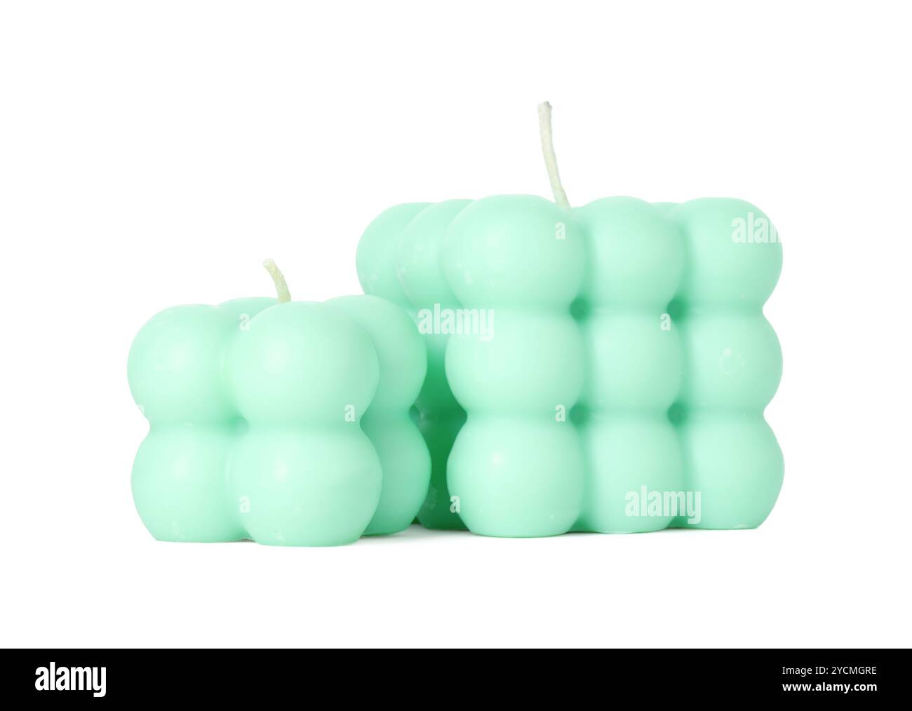 Beautiful turquoise bubble candles isolated on white Stock Photo - Alamy