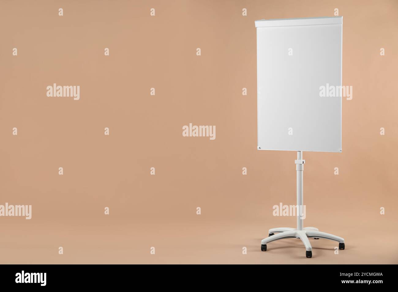 Flip chart on pale brown background. Mockup for design Stock Photo - Alamy