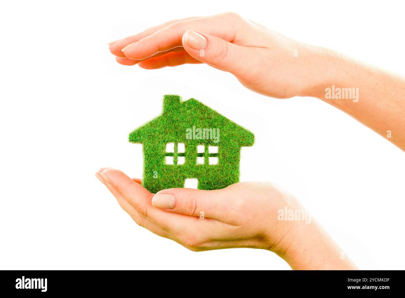 Grass home isolated on white background in human hands Stock Photo - Alamy