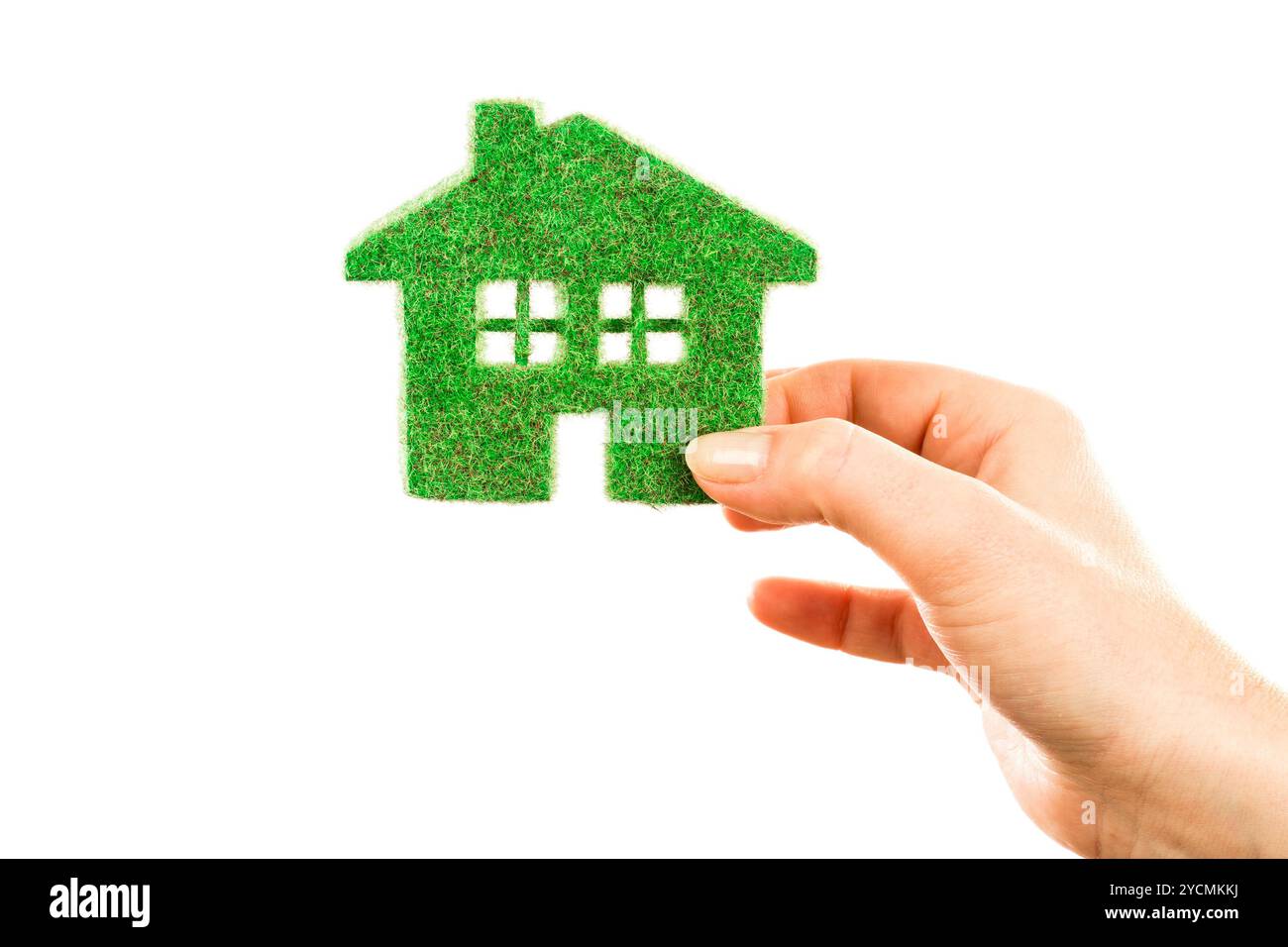 Grass home isolated on white background in human hands Stock Photo - Alamy