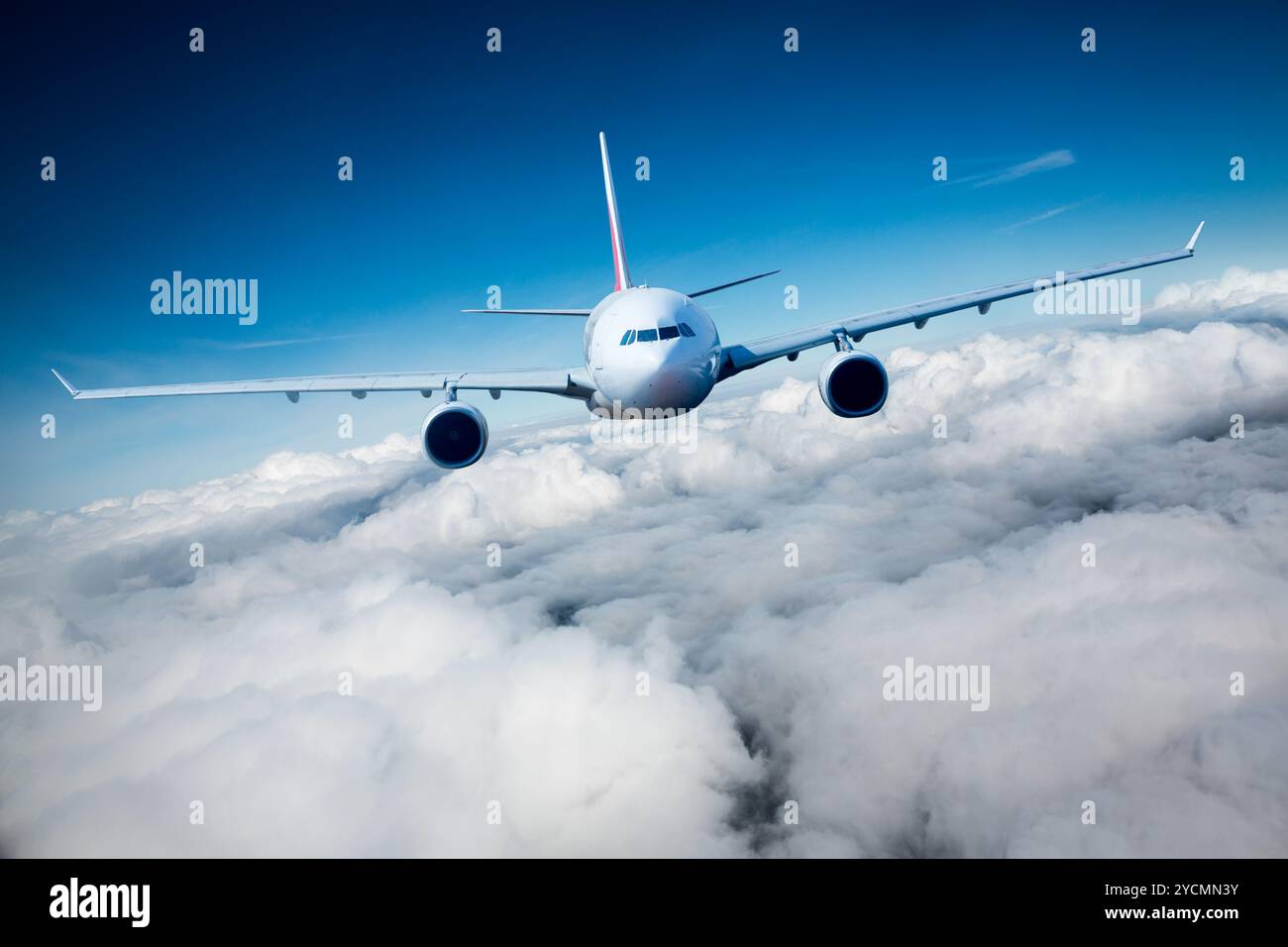 Passenger Airliner in the sky Stock Photo - Alamy