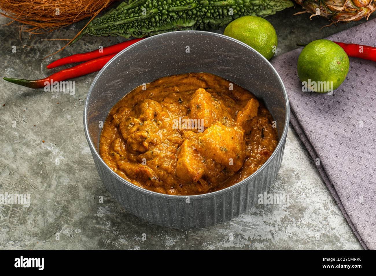 Indian cuisne - Chicken massala with sauce and spices Stock Photo - Alamy