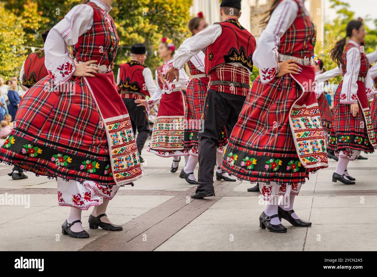 A group of dancers showcases traditional folk dance in colorful ...