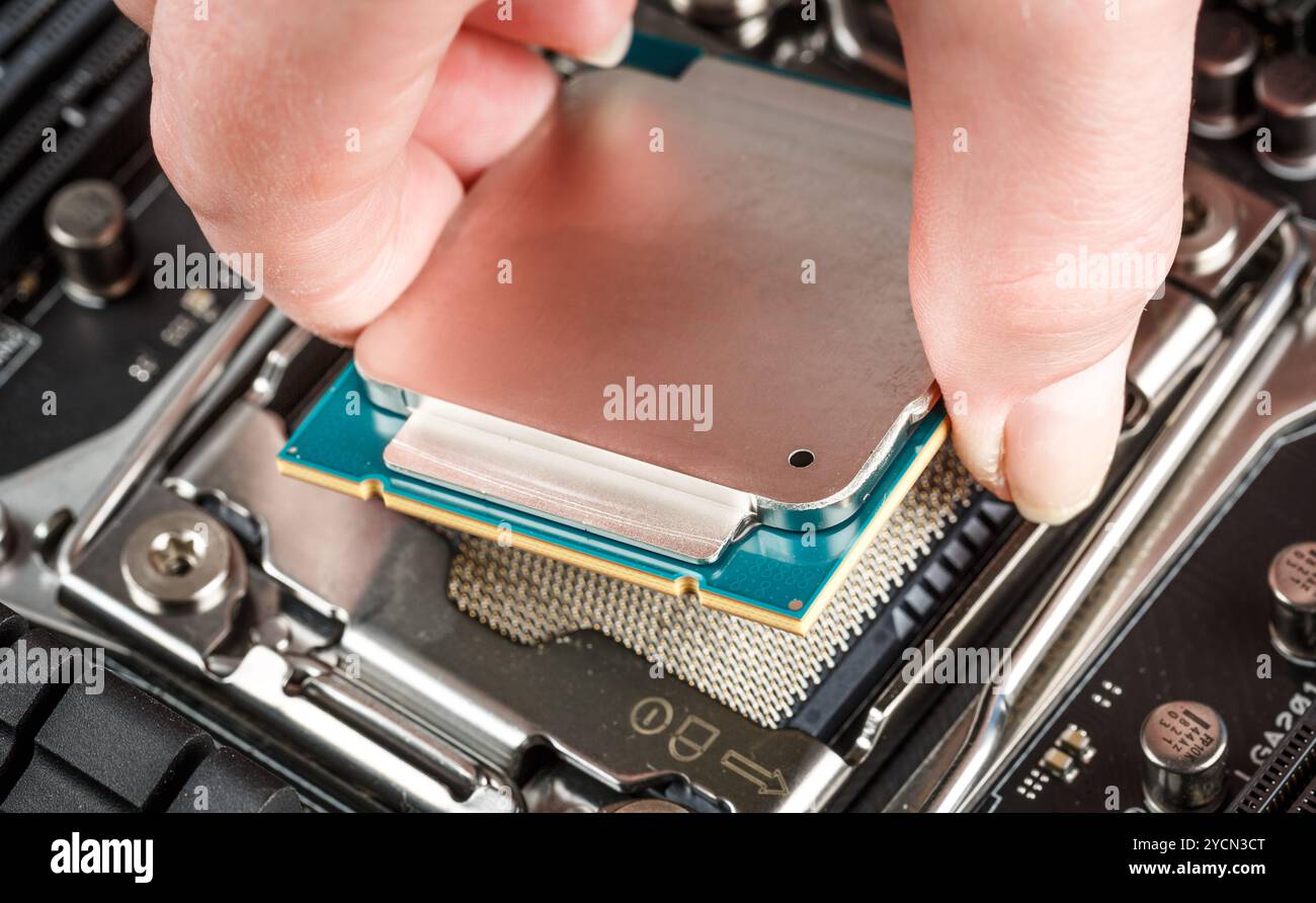 Modern processor and motherboard Stock Photo - Alamy