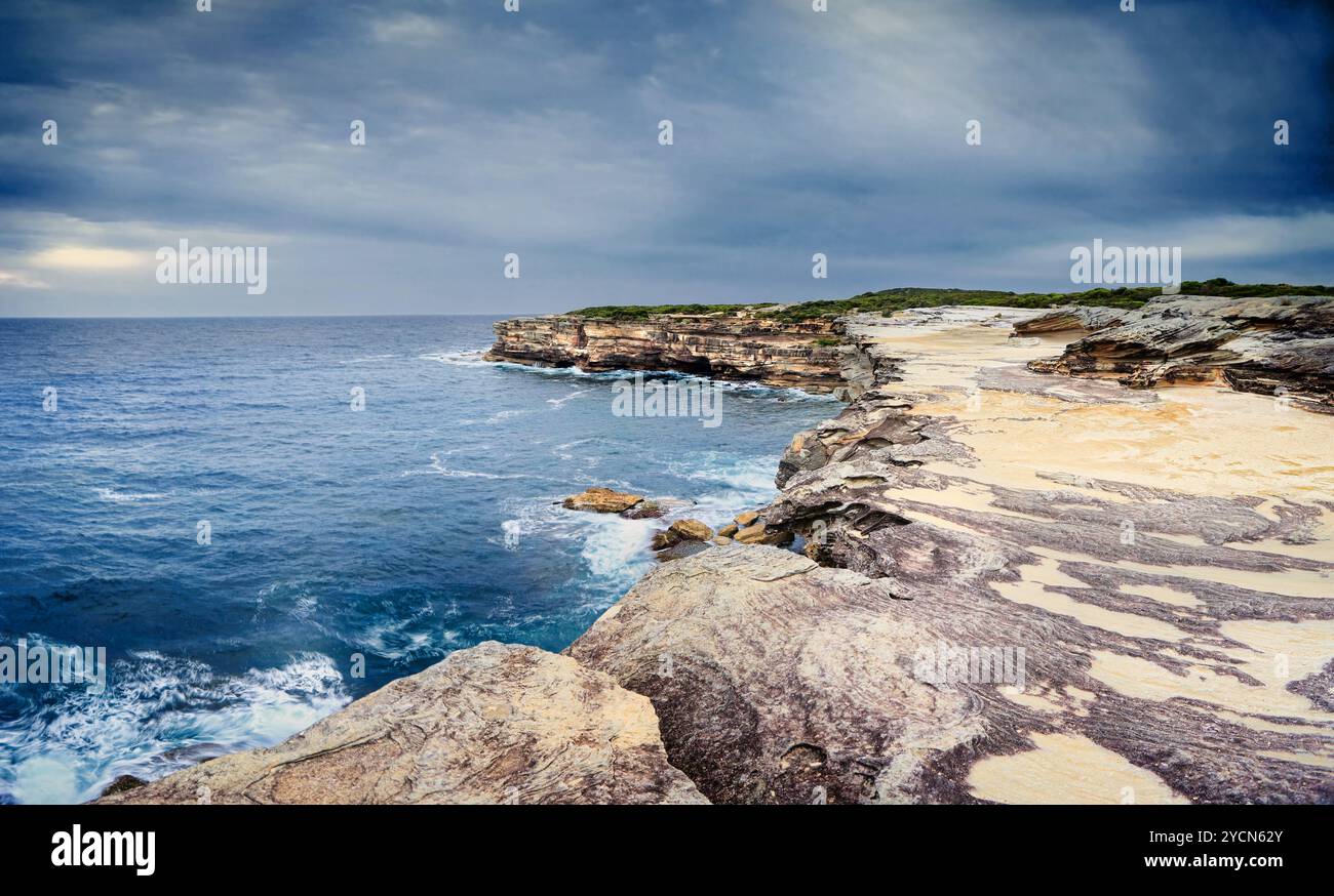 The sea caves at Cape Solander Stock Photo - Alamy