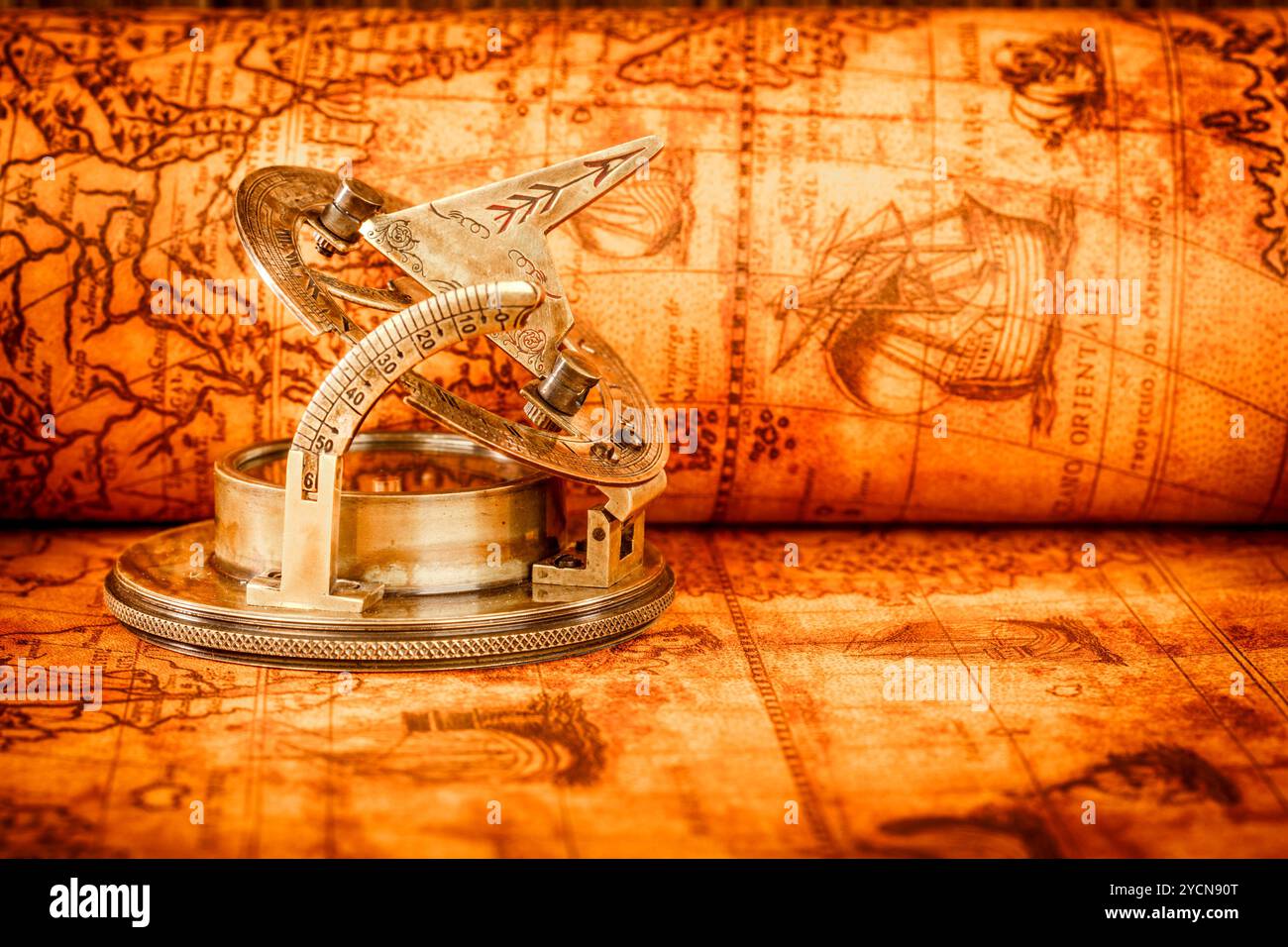 Vintage compass lies on an ancient world map Stock Photo - Alamy