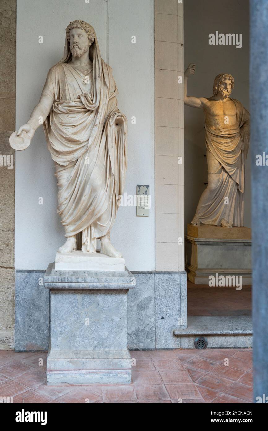 From left to right: Statue of togatus, with a modern head of MArcus ...