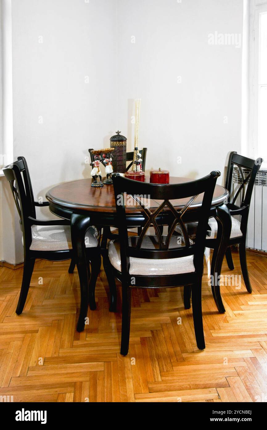 Black dining table chairs hi-res stock photography and images - Alamy