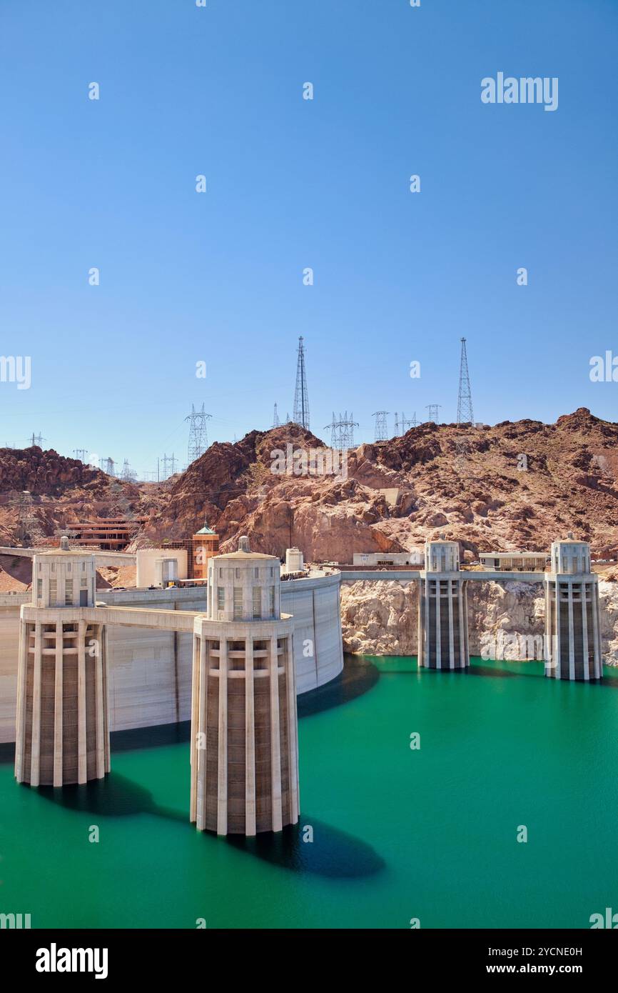 Hoover Dam in Boulder City, Nevada, spans the Colorado River, showcasing monumental engineering ...