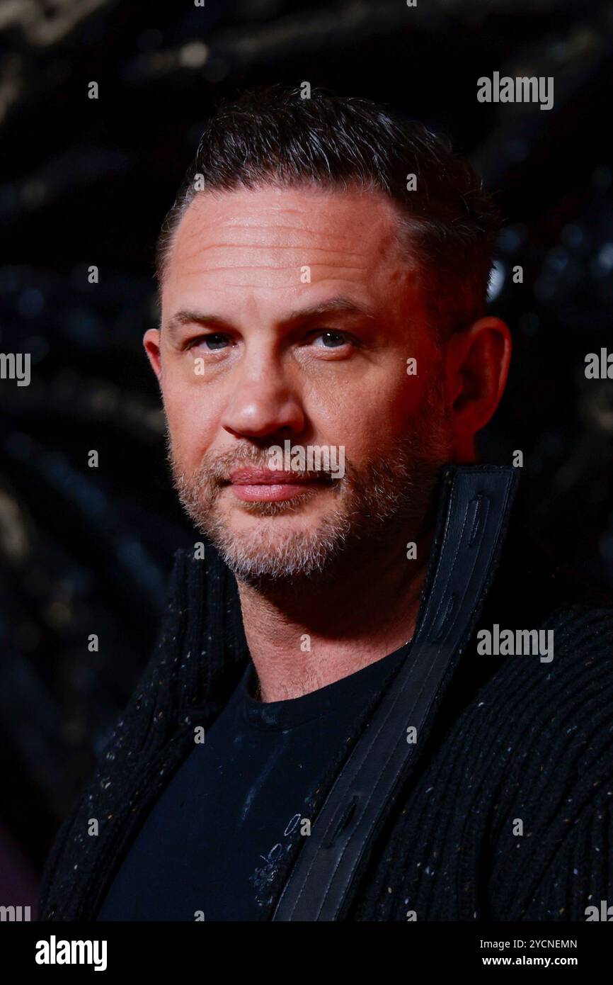 Tom Hardy poses for photographers upon arrival at the premiere of the ...