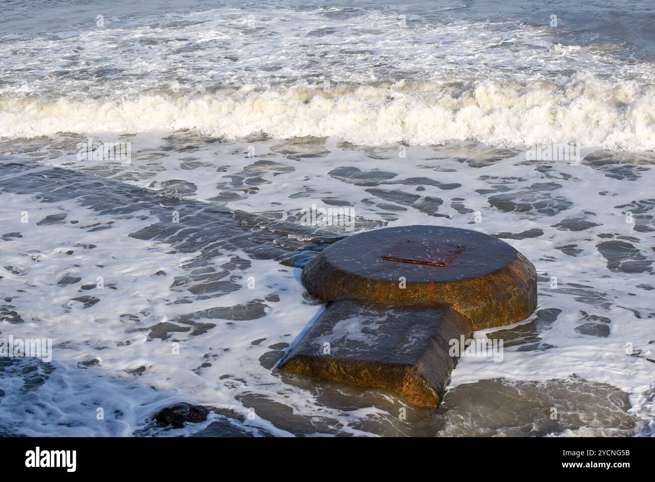 Concrete sewer pipes in the ocean leading to marine outfall into the ...
