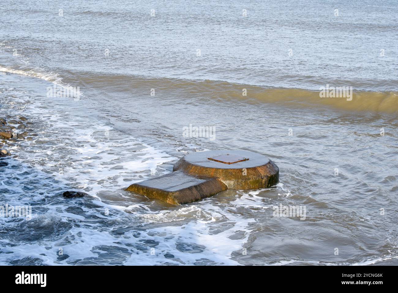 Concrete sewer pipes in the ocean leading to marine outfall into the ...