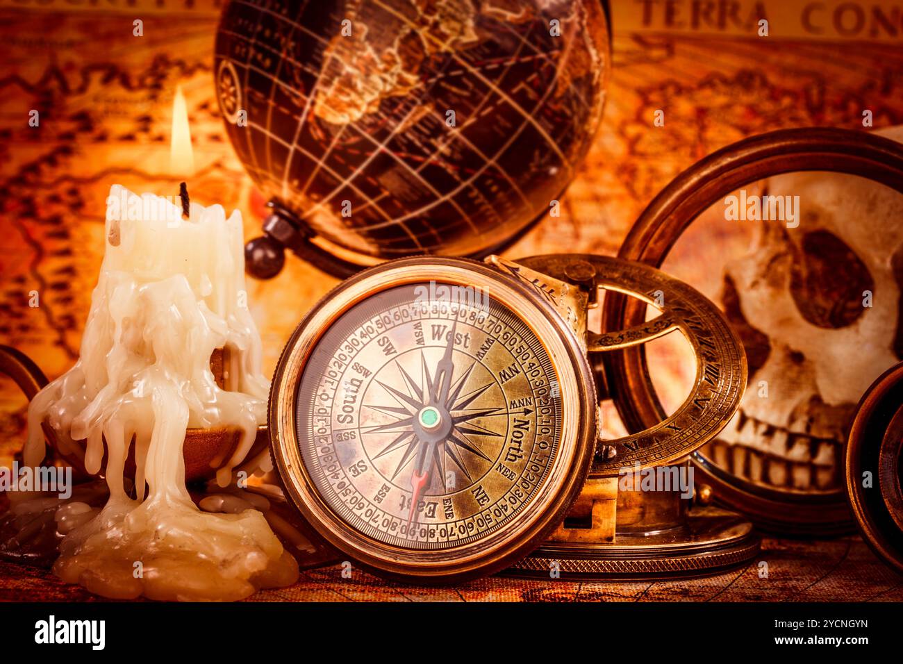 Vintage magnifying glass lies on an ancient world map Stock Photo - Alamy