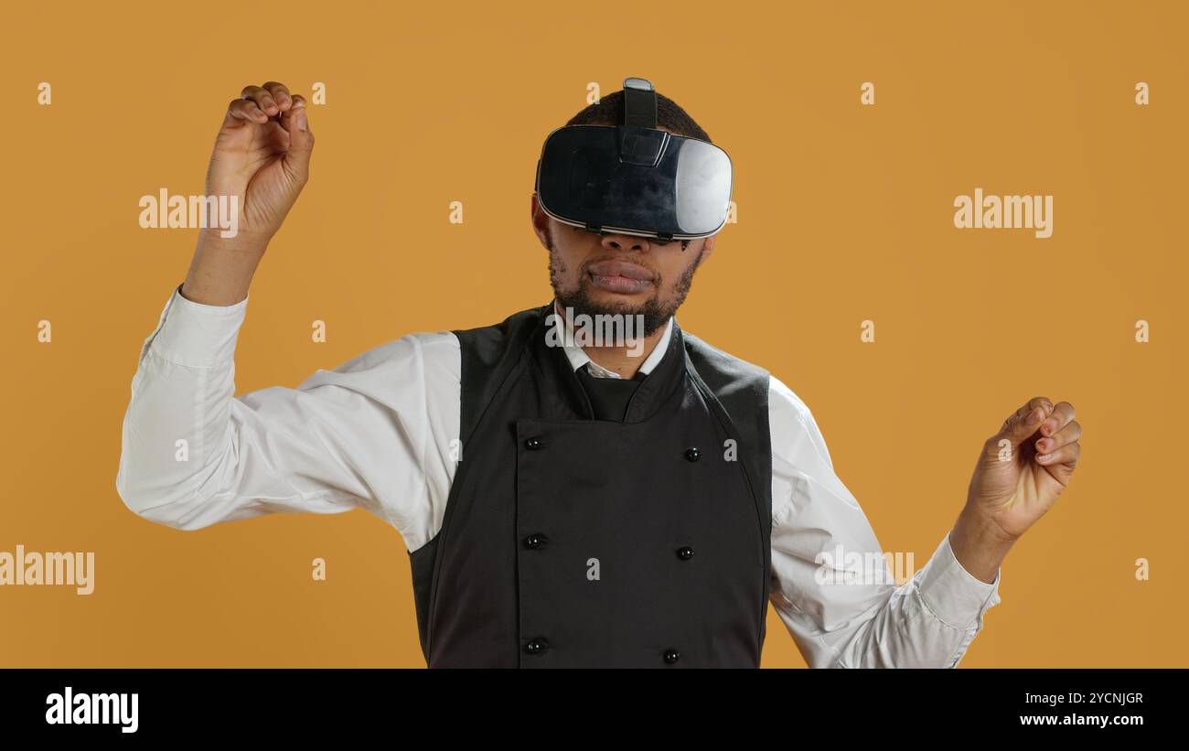 Restaurant waiter uses virtual reality hi-res stock photography and ...