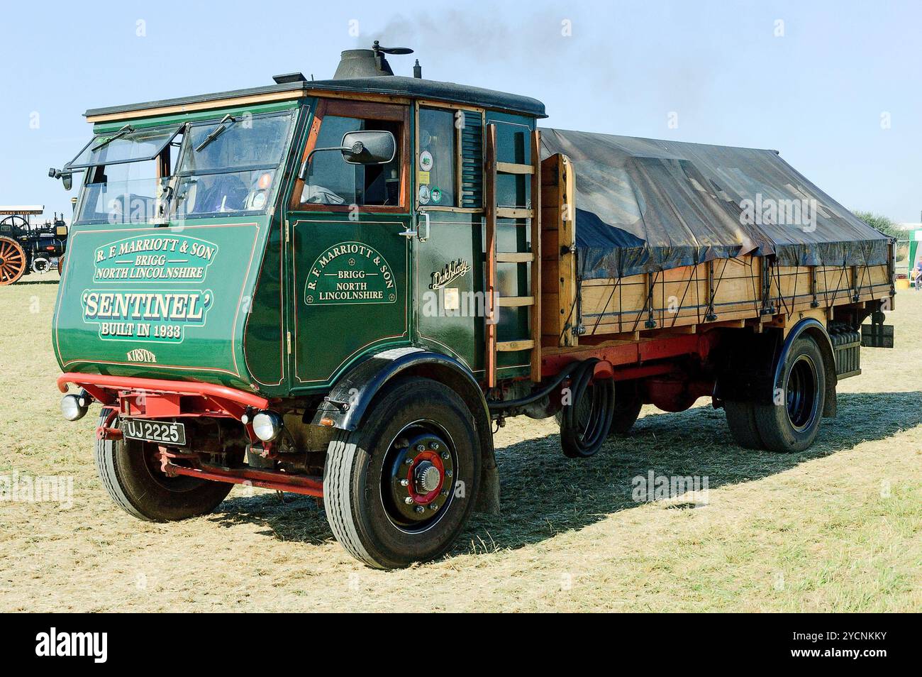 A 1933 green Sentinel steam powered truck, UJ 2225, drives around the ...