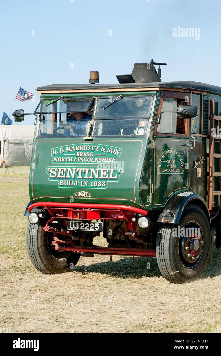 A 1933 green Sentinel steam powered truck, UJ 2225, drives around the ...