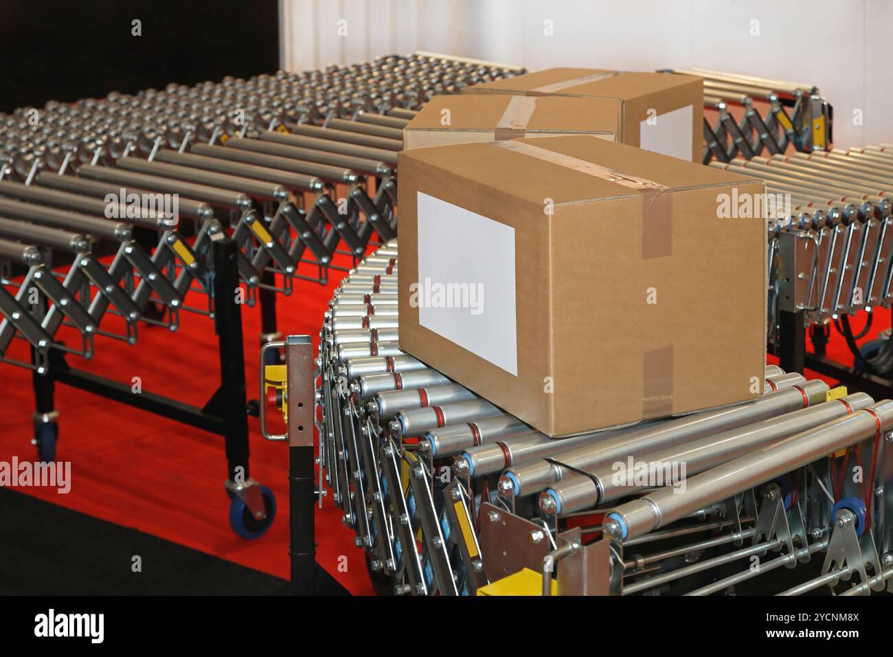 Conveyor rollers box Stock Photo - Alamy