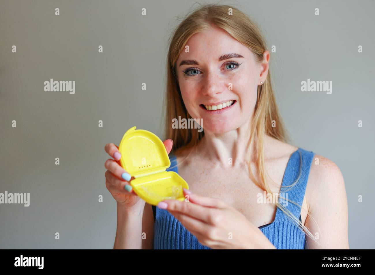 Transparent aligners in a box. Invisible braces. Clear teeth ...