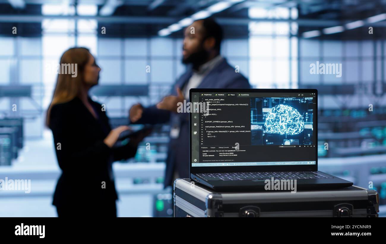 Focus on notebook used by server farm technicians in background using artificial intelligence ...