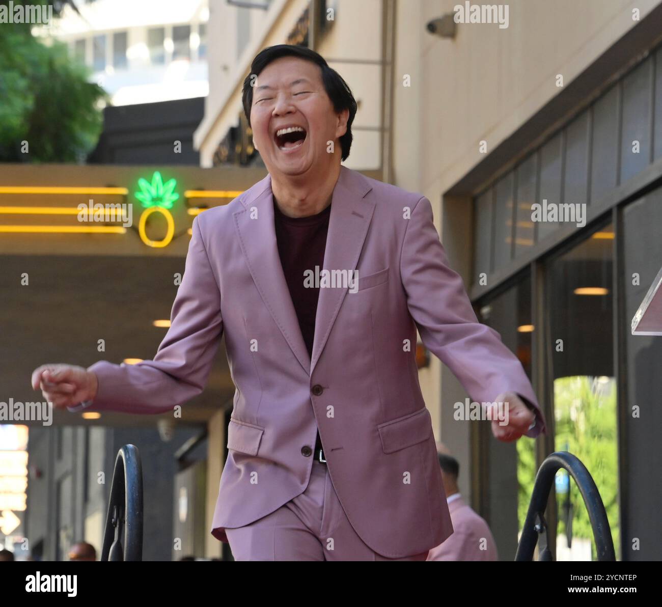 Actor Ken Jeong (L) reacts to comments by actor Joel McHale during an ...