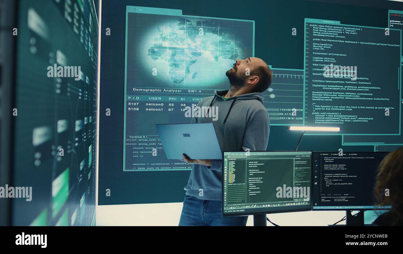 Cyber Defense Expert Examining Data On A Big Screen In Governmental