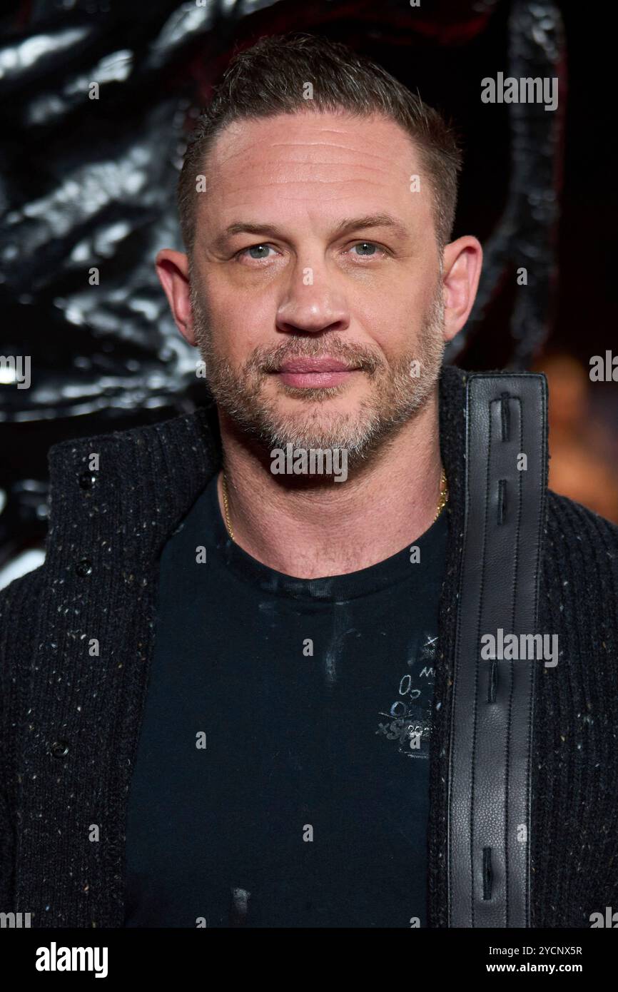 Tom Hardy poses for photographers upon arrival at the premiere of the ...