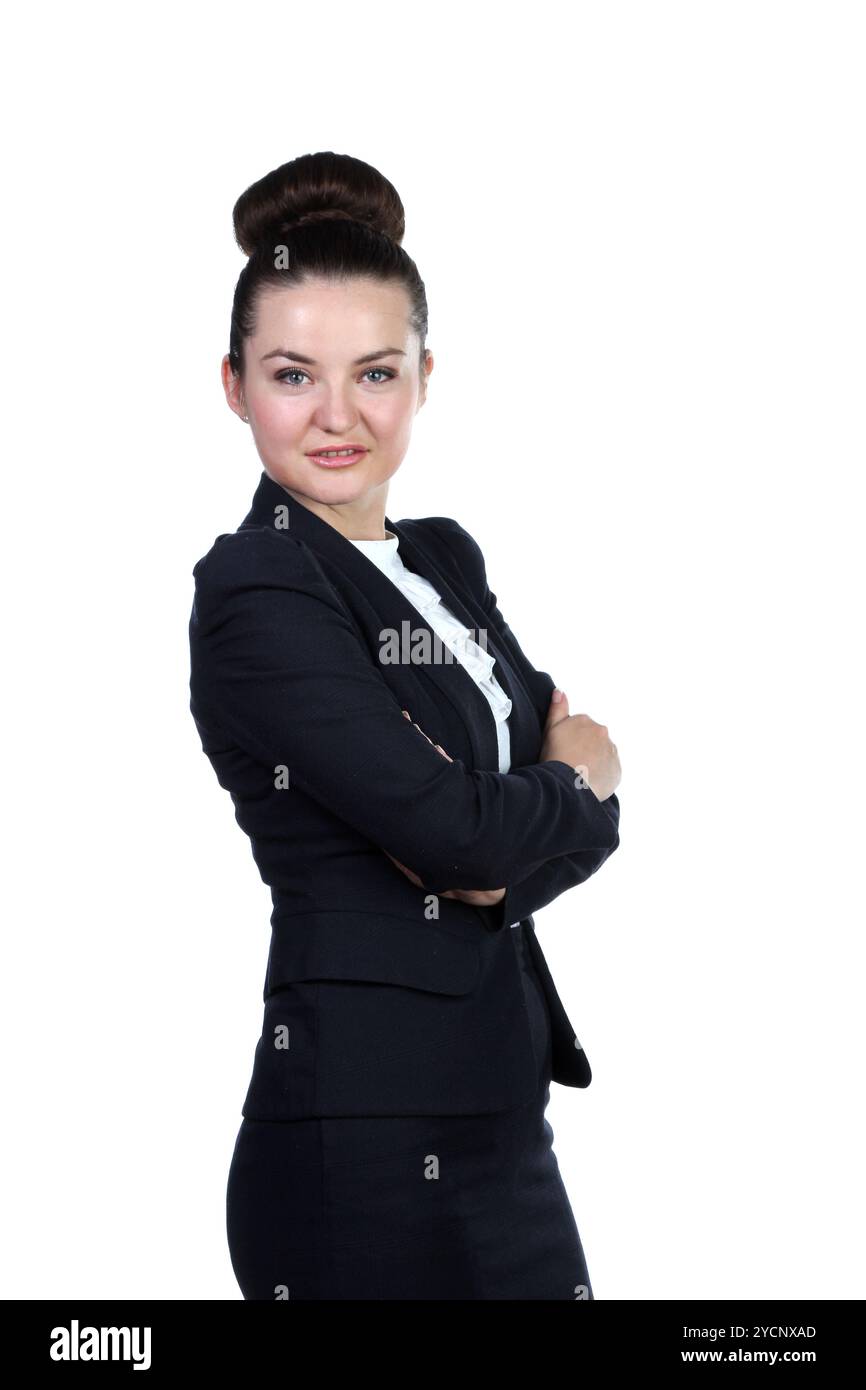 Smiling professional lady standing sideways with arms crossed Stock ...