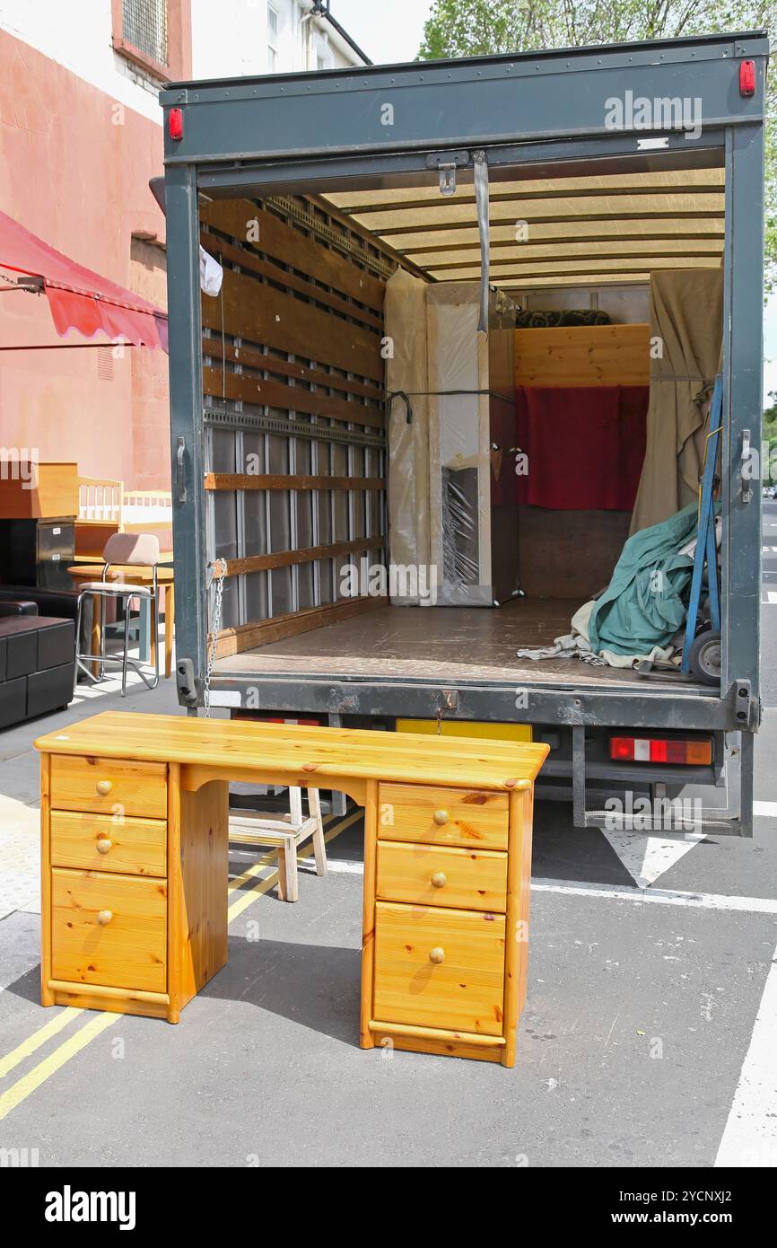 Open rear end of moving furniture truck Stock Photo - Alamy