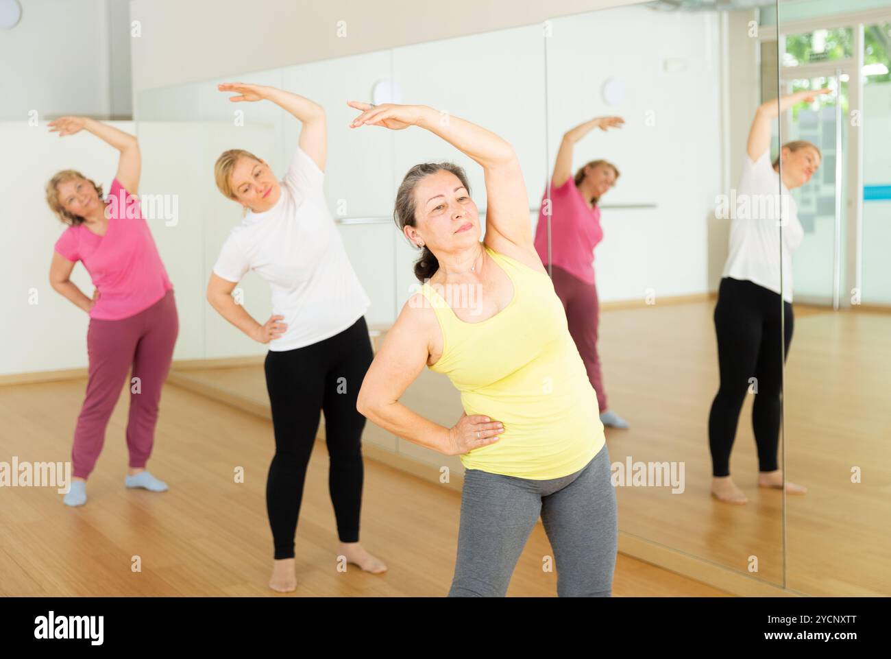 Adults training swing steps at dance class Stock Photo - Alamy