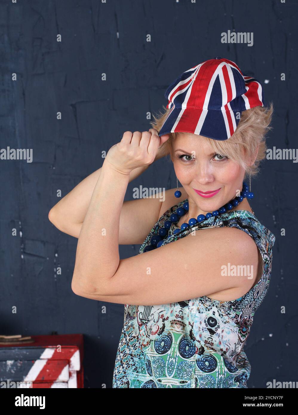 Happy woman in baseball cap hi-res stock photography and images - Alamy