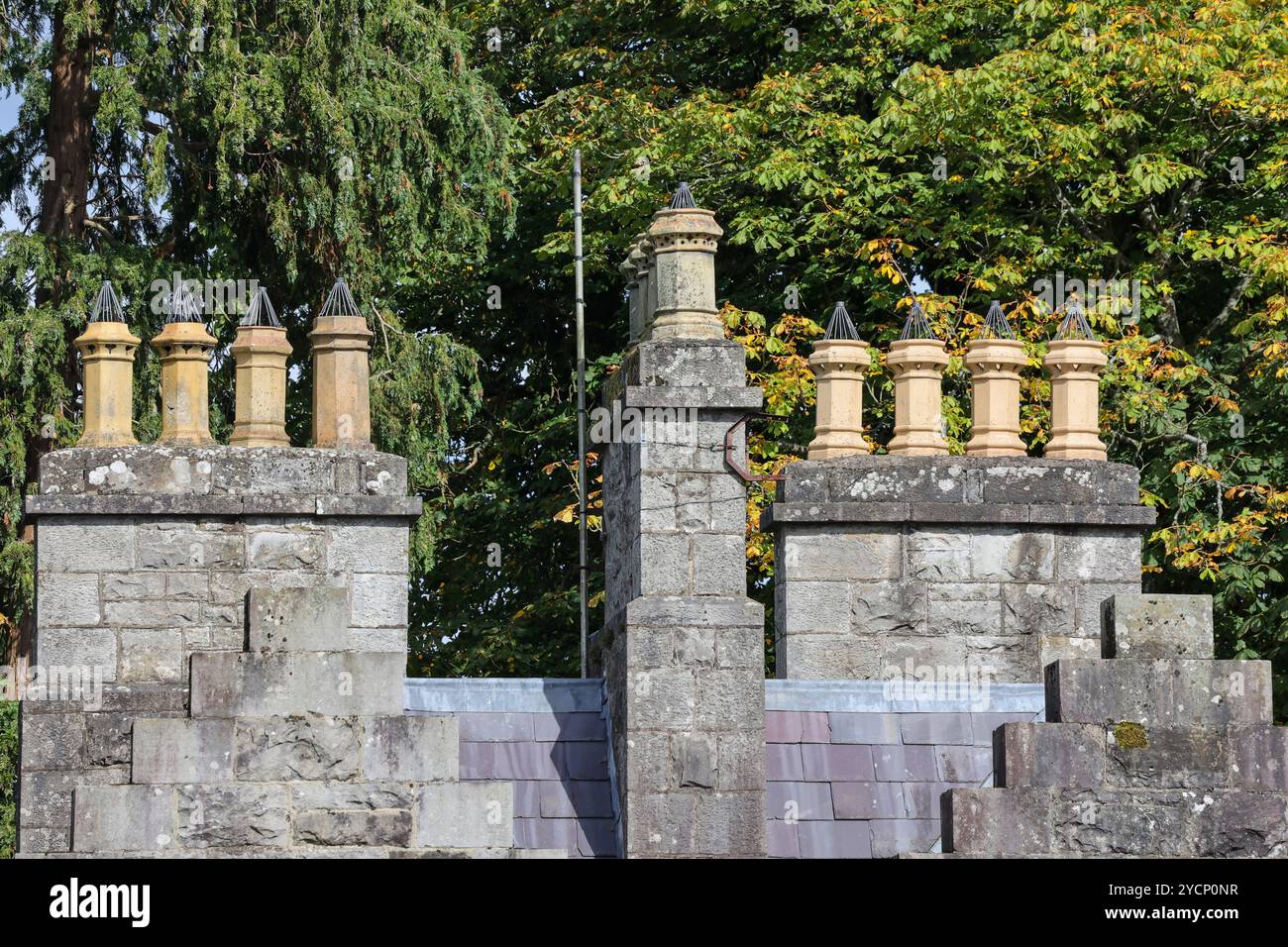 Twelve chimney pots ornate chimneys on entrance lodge to Castle Leslie ...