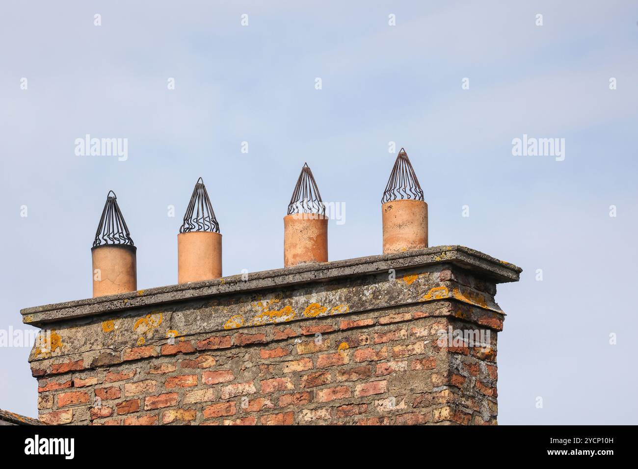 Four chimney pots bird guards hi-res stock photography and images - Alamy