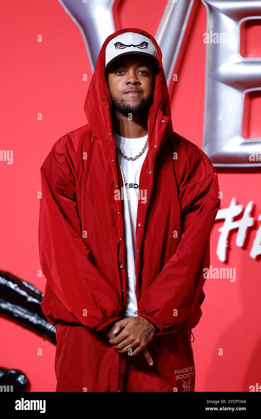 Chip poses for photographers upon arrival at the premiere of the film ...