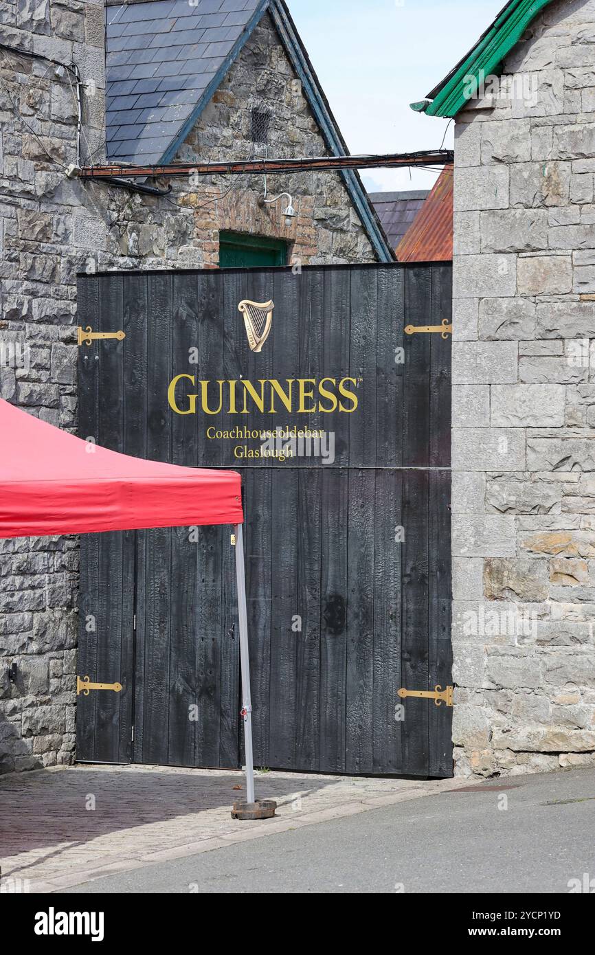 Gate advertising Guinness black wooden gate Coach House Old Bar ...