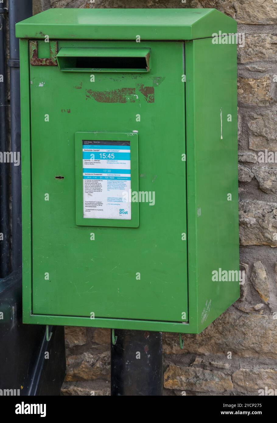 Modern An Post green metal post box in Irish village, Post box rural ...