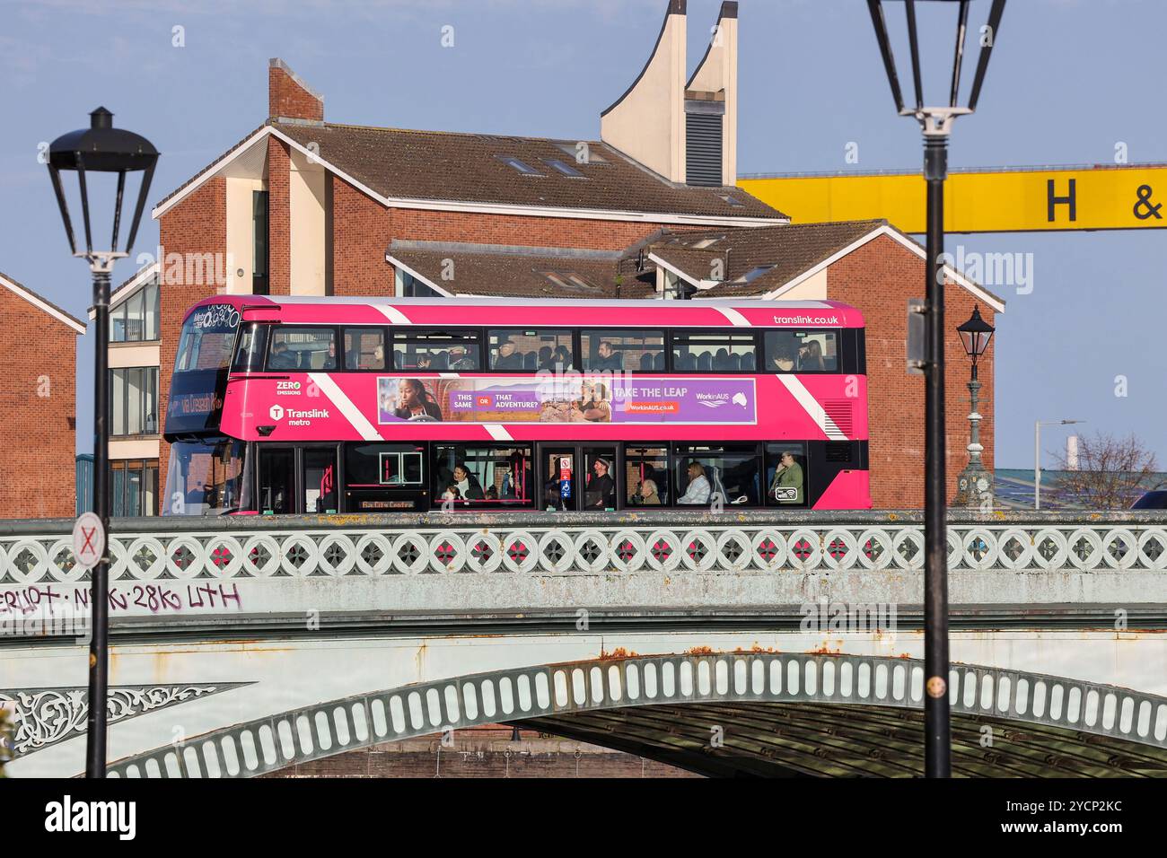 Translink metro bus bus with passengers on bridge Belfast. Bus public ...