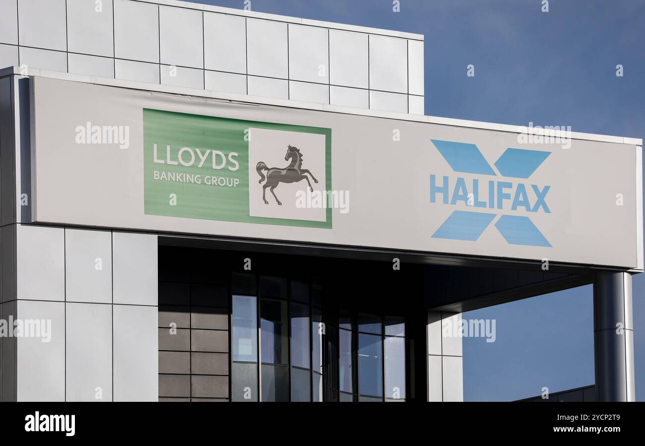 Signage, UK bank signs fitted on office building exterior. Lloyds ...