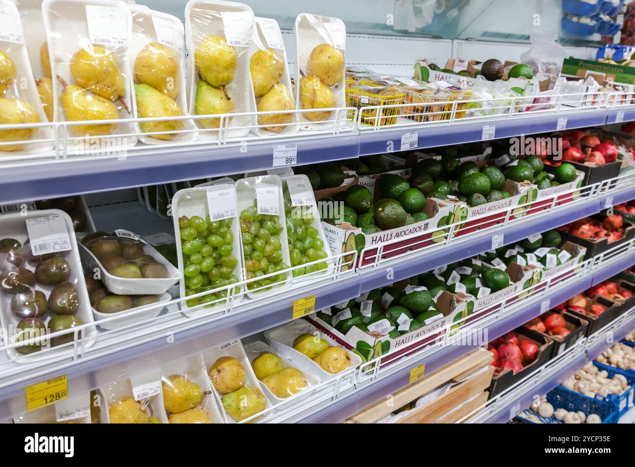 Showcase with fresh fruits in supermarket Stock Photo - Alamy
