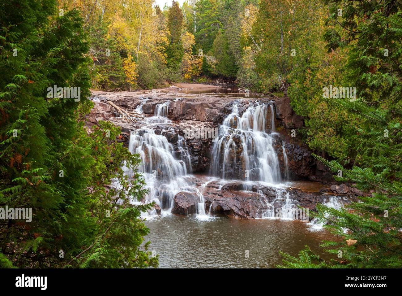 The high falls at Gooseberry Falls State Park in Minnesota on an autumn ...