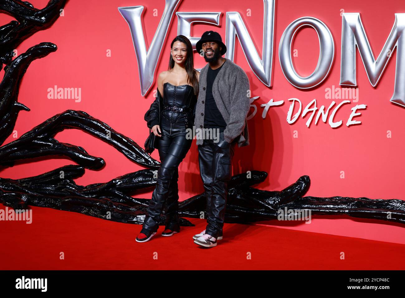 Taia Tulher, left, and Mo Gilligan pose for photographers upon arrival ...